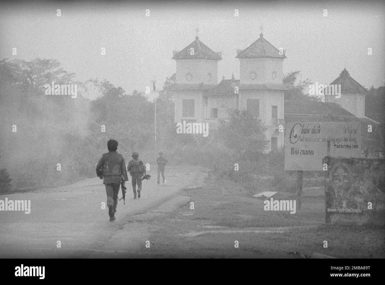 South Vietnames soldiers move down Route 1 toward the Cao Dai church at ...