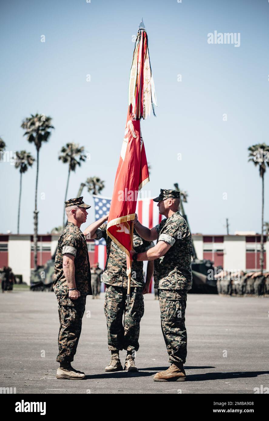 U.S. Marine Corps Lt. Col Daniel R. Petronzio (left) receives the ...