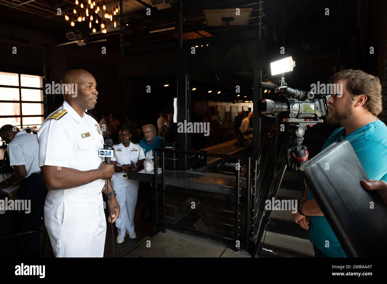 Rear Adm. Lex Walker, Commander, Navy Recruiting Command, speaks with ...