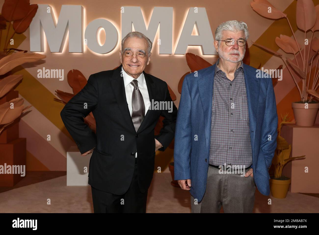 Directors Martin Scorsese, left, and George Lucas, right, attend the Museum of Modern Art's ...