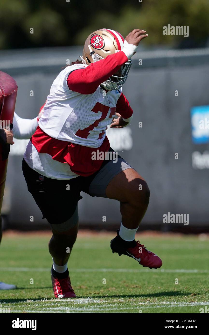 San Francisco 49ers defensive lineman Kevin Atkins takes part in drills ...
