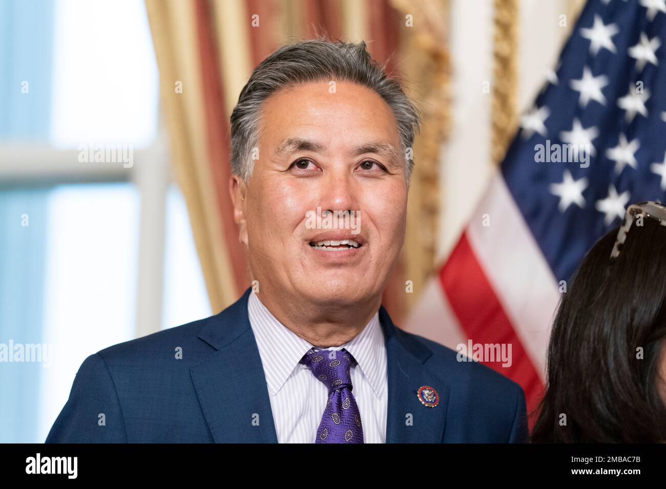 Rep. Mark Takano, D-Calif., stands before House Speaker Nancy Pelosi of ...