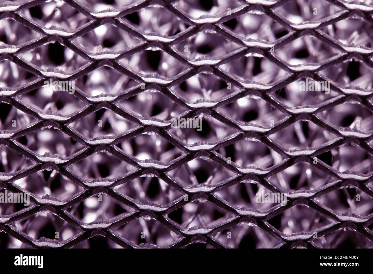 A Wire Mesh Close Up Steel Surface for Background In Purple Pink Stock ...