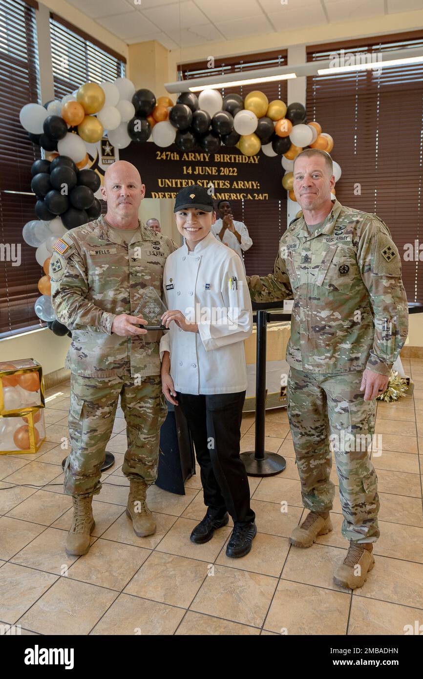 Col. Damon Wells, commander of the 4th Infantry Division Artillery (DIVARTY), and Command Sgt ...