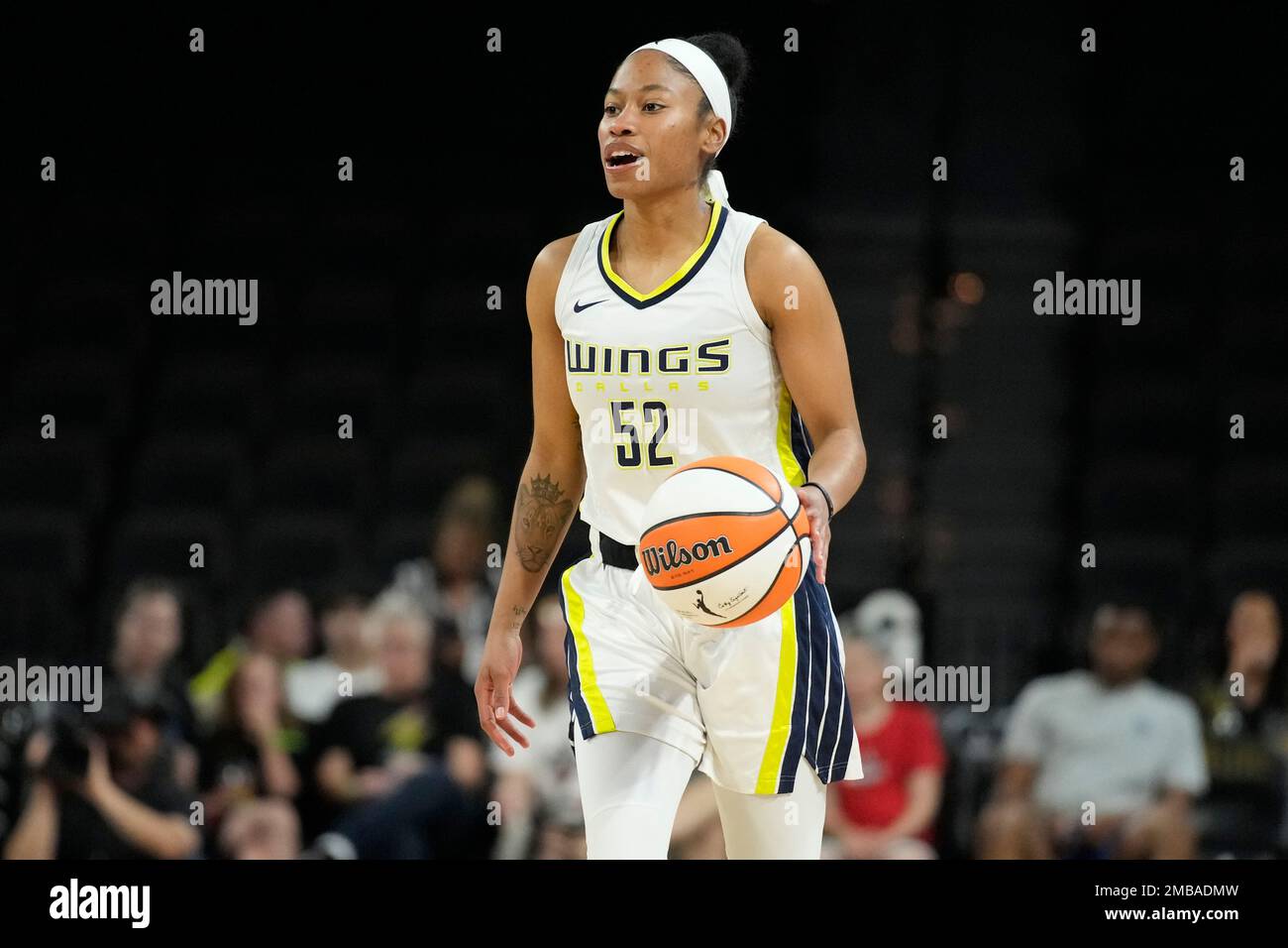 Dallas Wings' Tyasha Harris (52) plays against the Las Vegas Aces ...