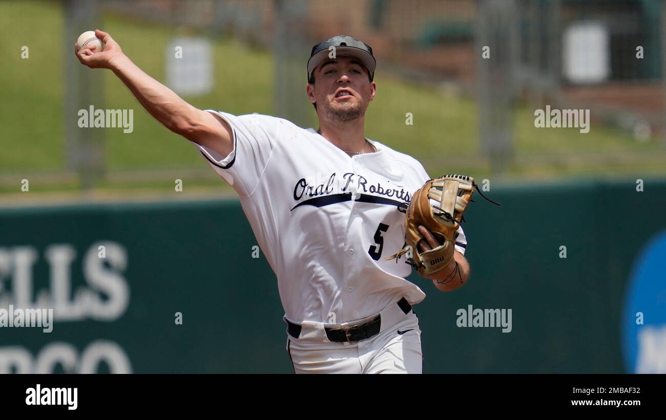 Oral Roberts infielder Holden Breeze (5) throws to first again TCU ...