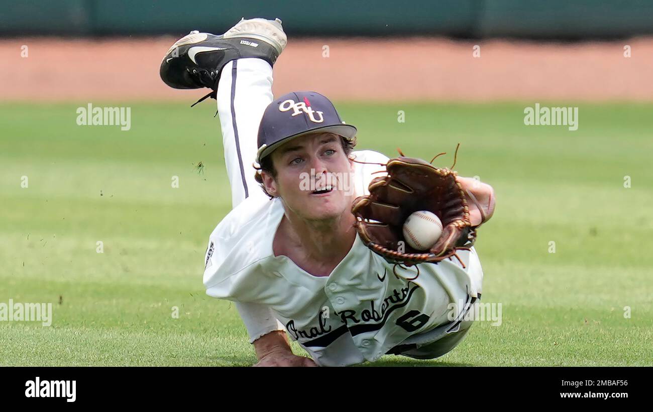 Oral Roberts utility Connor Beichler (6) attempts a diving catch against TCU during an NCAA ...