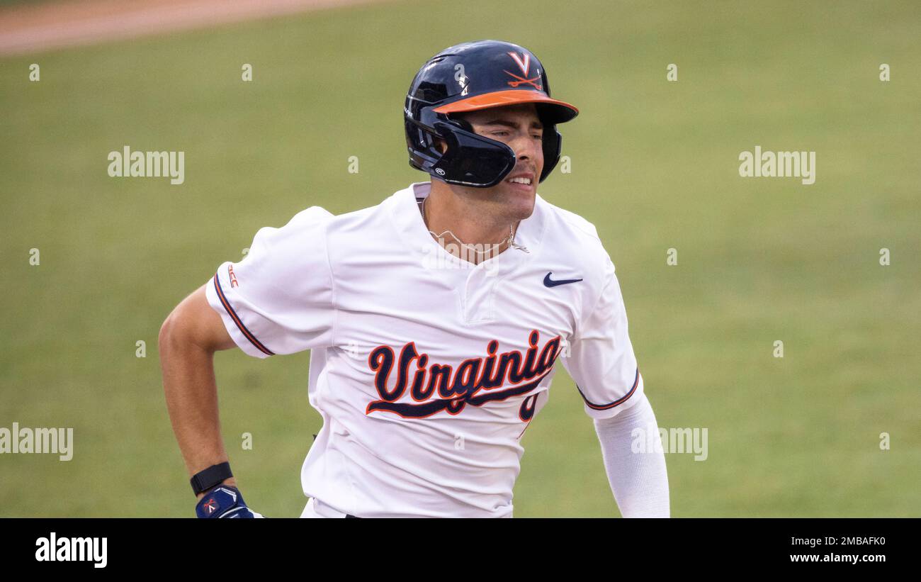Virginia's Chris Newell (9) runs to first base during an NCAA baseball ...