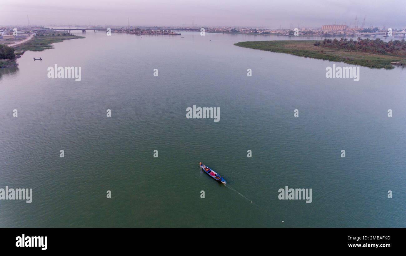 This aerial photo shows fishermen on the Shatt al-Arab waterway in ...