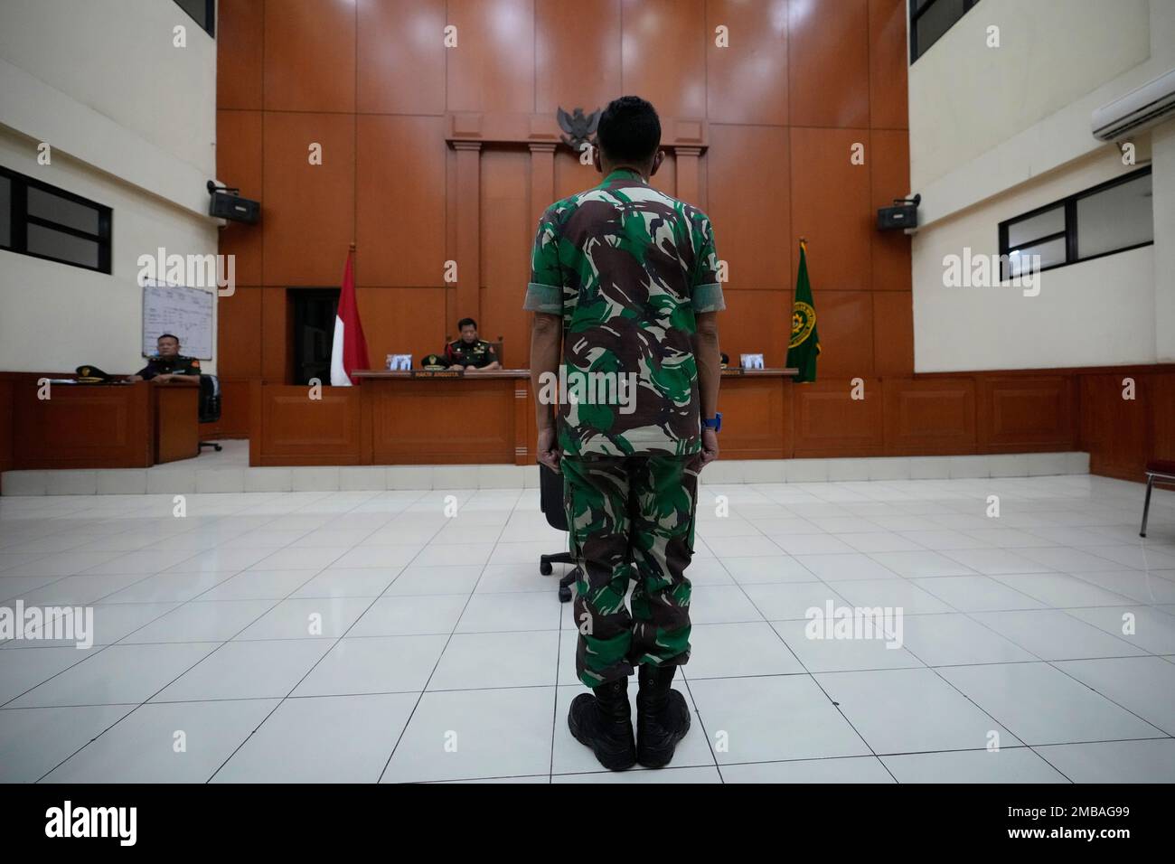 Colonel Priyanto, a mid rank army officer, stands in a courtroom during ...