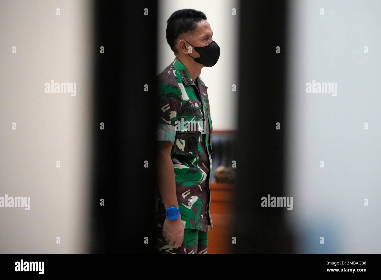 Colonel Priyanto, a mid rank army officer, stands in a courtroom during ...