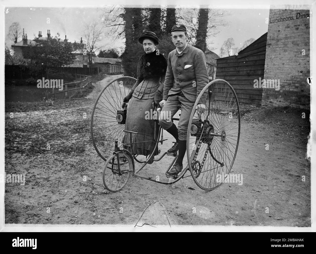 Man and a woman sitting on a double tricycle, England, c1890. Portrait ...