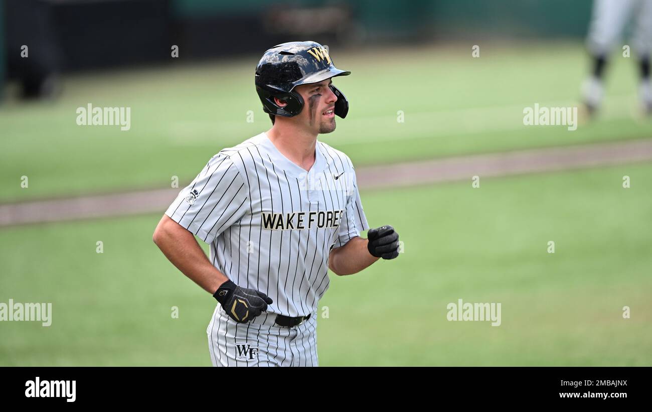 Wake Forest's Pierce Bennett trots to first on a walk issued by LIU ...