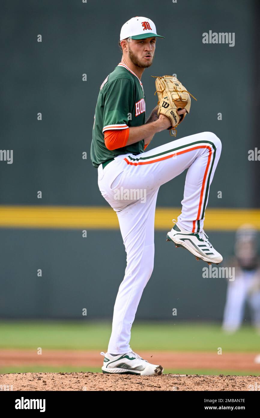 Miami's Carson Palmquist pitches during an NCAA baseball game against ...