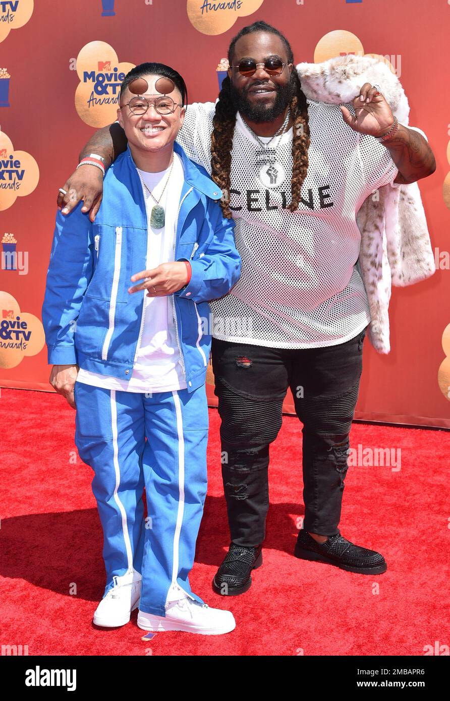 Tim Chantarangsu, left, and Darren Brand arrive at the MTV Movie and TV ...