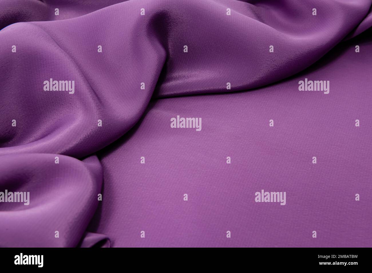 A piece of purple, red cloth. Fabric texture for background and design ...