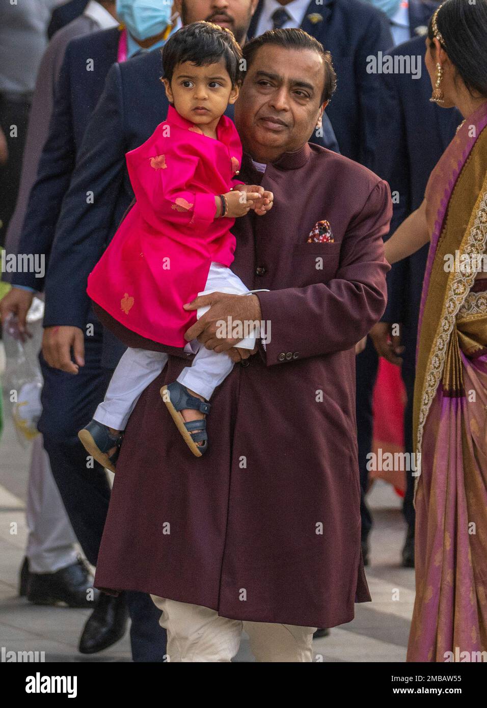 Reliance Industries Limited Chairman Mukesh Ambani carries his grandson ...
