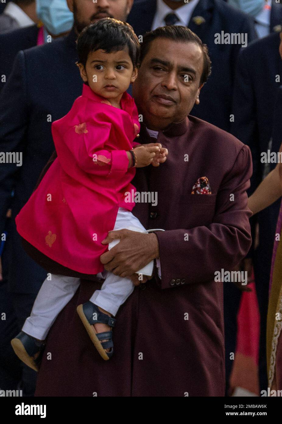 Reliance Industries Limited Chairman Mukesh Ambani carries his grandson ...