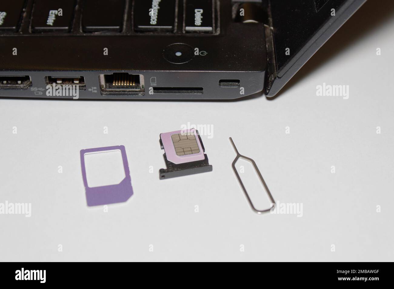 laptop sim slot insert Internet sim card Stock Photo - Alamy