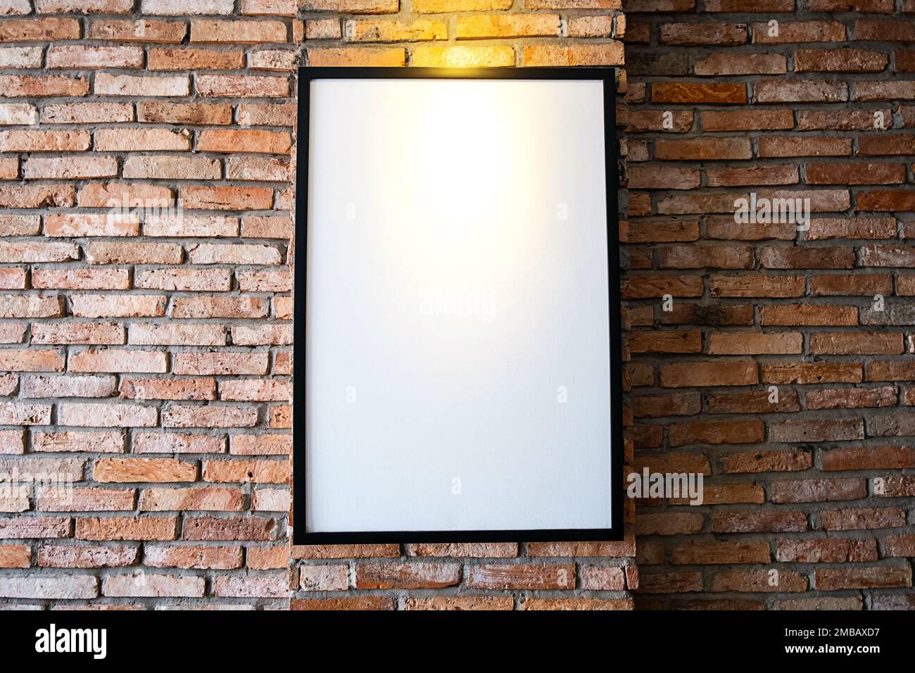 Mock up poster on brick wall. Template display for your adverting or ...