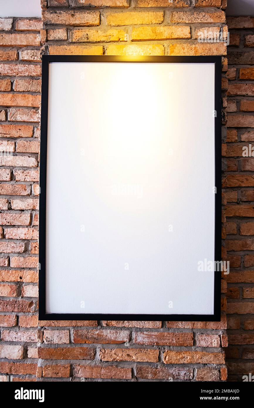 Mock up poster on brick wall. Template display for your adverting or ...
