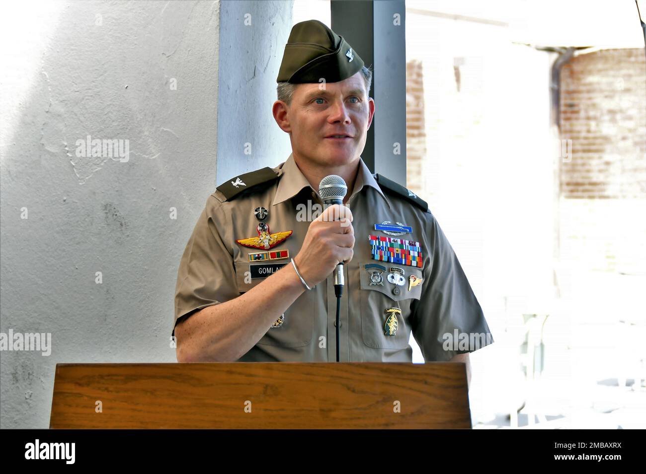 U.S. Army Garrison Italy Commander, Col. Matthew Gomlak, speaks during ...