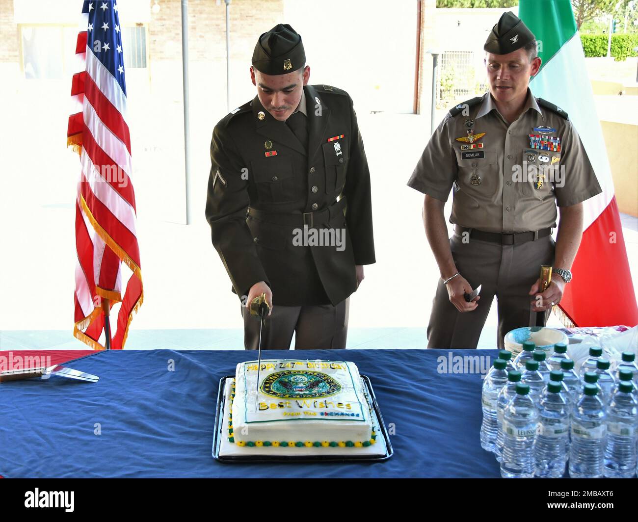 Right, U.S. Army Garrison Italy Commander, Col. Matthew Gomlak, and Pv2 ...