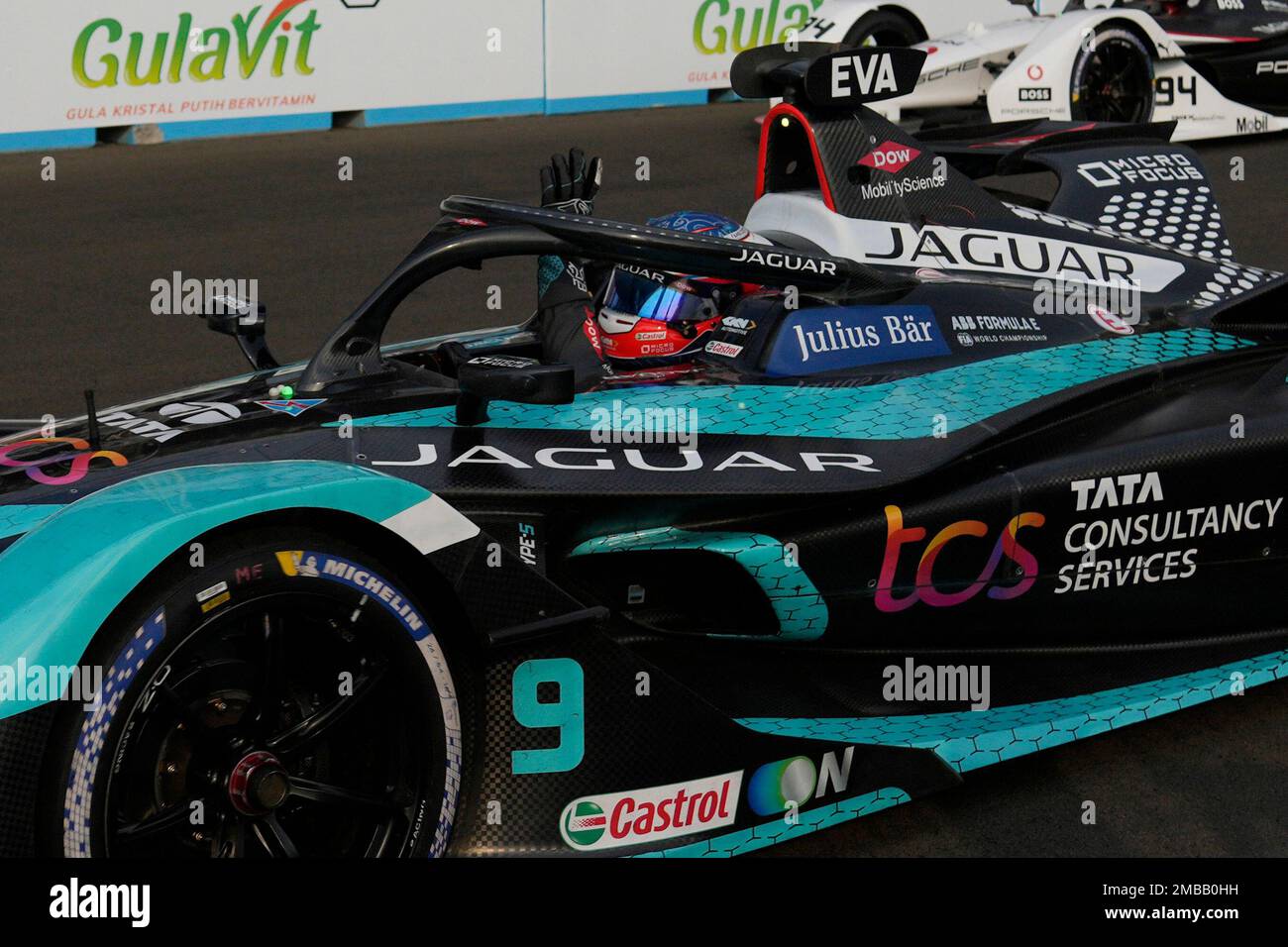 Jaguar TCS driver Mitch Evans of New Zealand waves from his car after ...