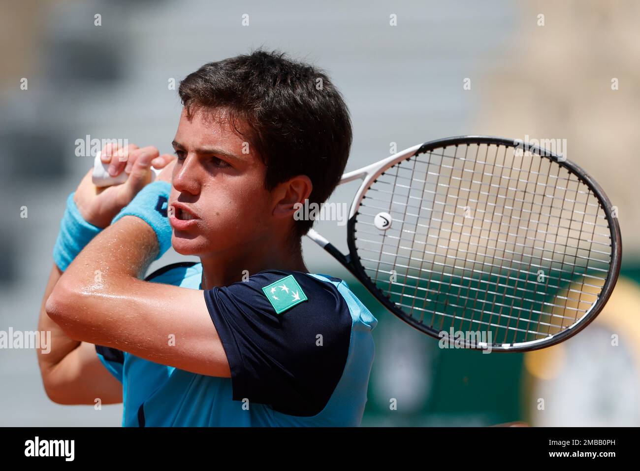 Belgium's Gilles Arnaud Bailly returns the ball to France's Gabriel ...