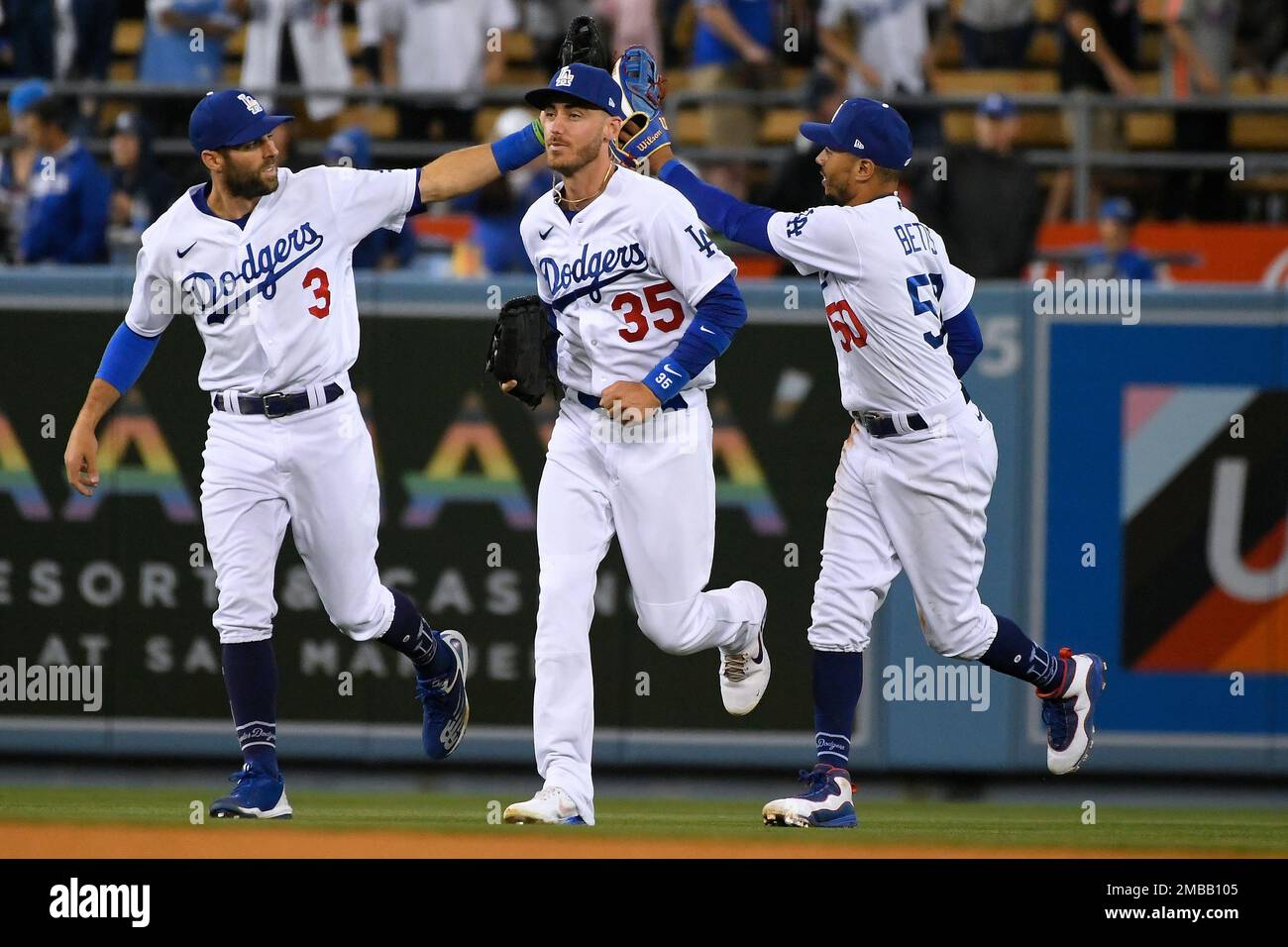 Los Angeles Dodgers' Chris Taylor, left, Cody Bellinger and Mookie ...