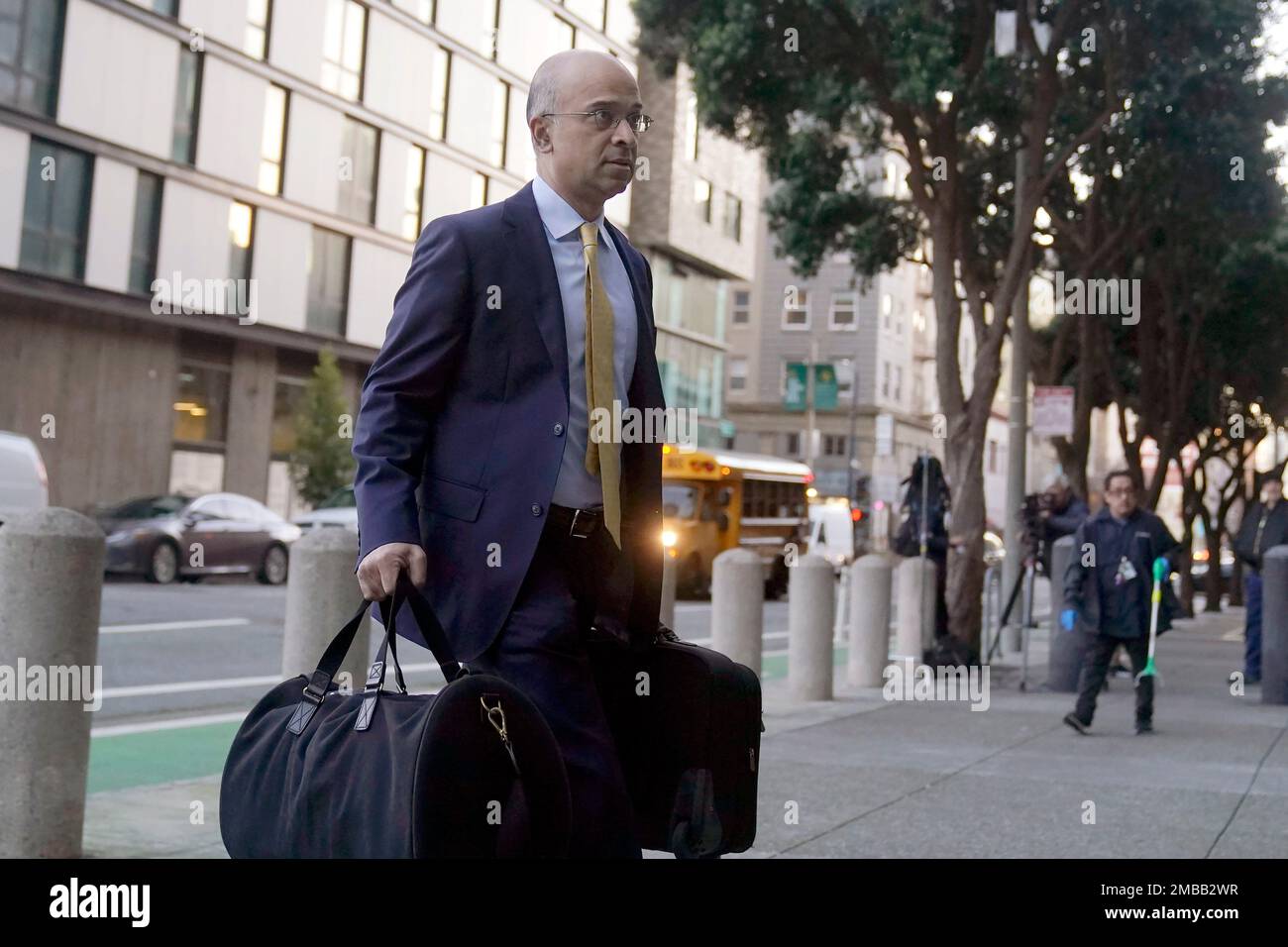 Harvard professor Guhan Subramanian arrives at a federal courthouse in ...