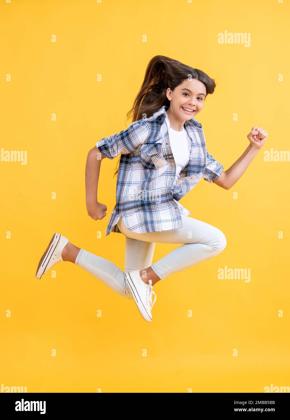 Teenage child isolated jumping hi-res stock photography and images - Alamy