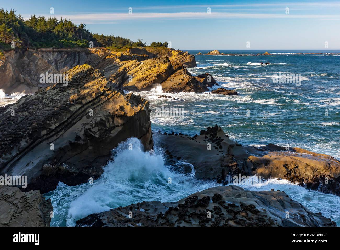 Sandstone formations and Pacific Ocean at Shore Acres State Park on the ...
