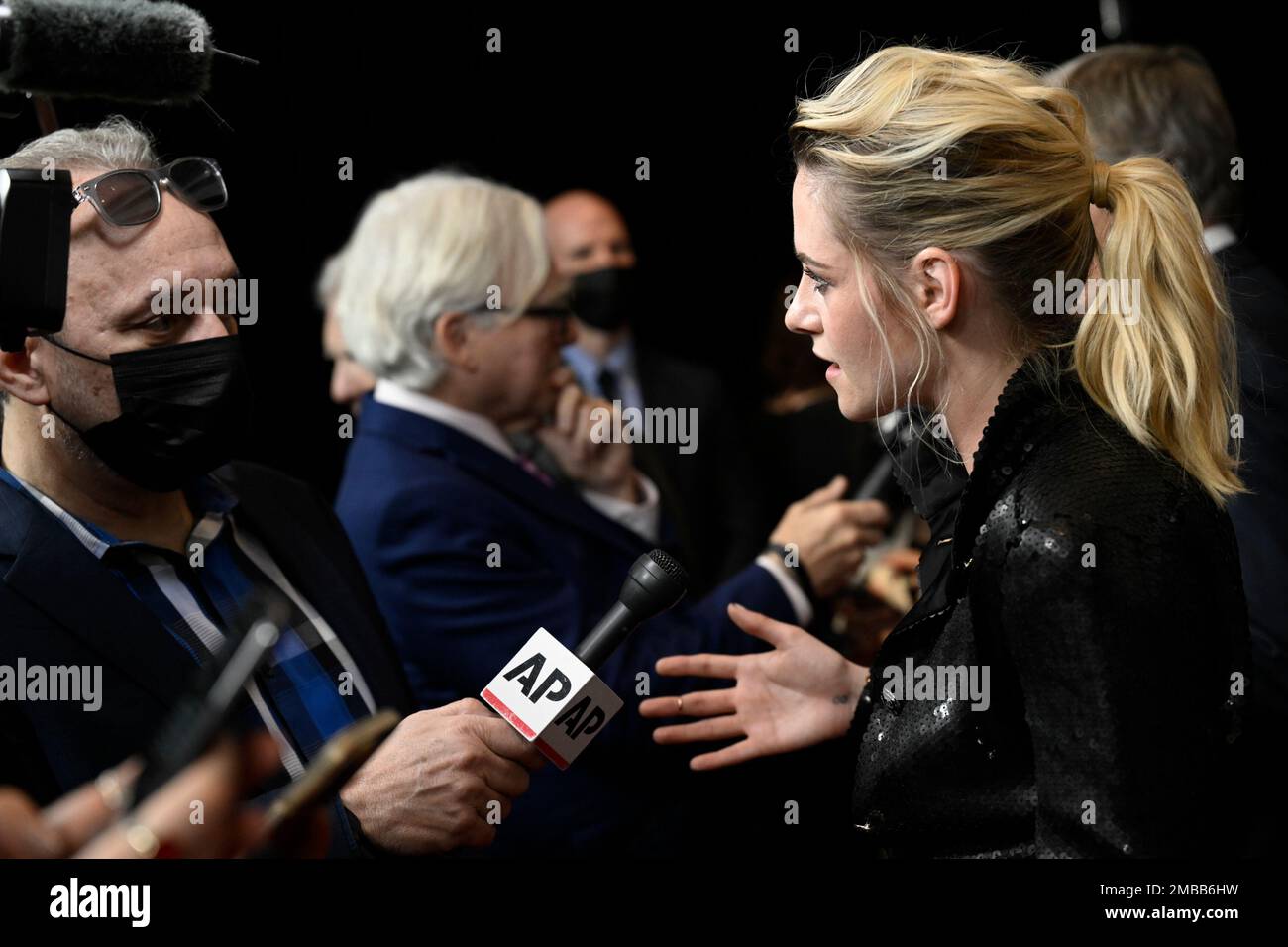 Kristen Stewart, right, speaks with AP entertainment video producer ...