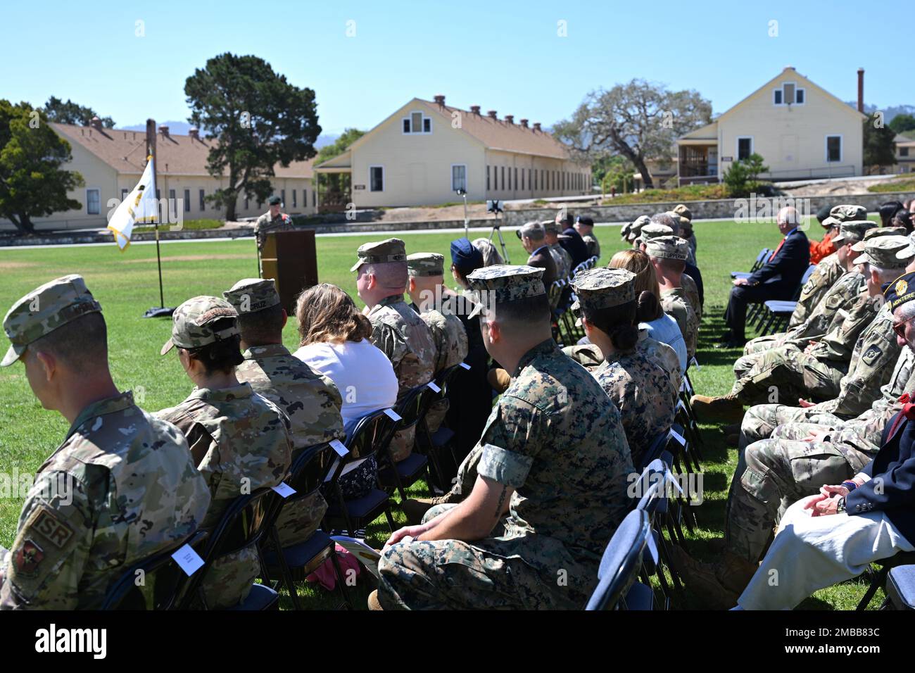 Members of the audience listen as Col. Sam Kline, commander of U.S. Army Garrison Presidio of ...