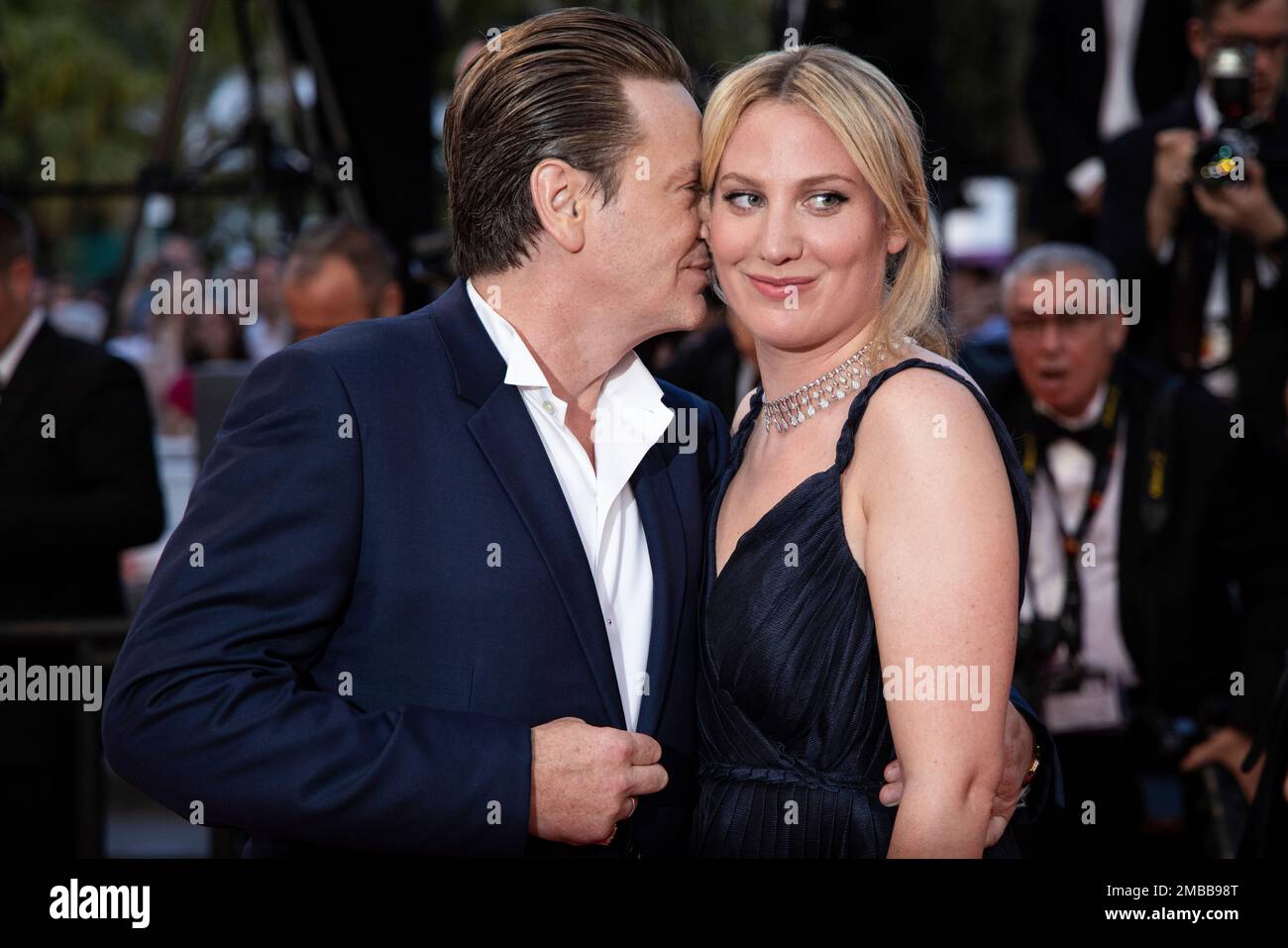 Benoit Magimel and Margot Pelletier pose for photographers upon arrival ...