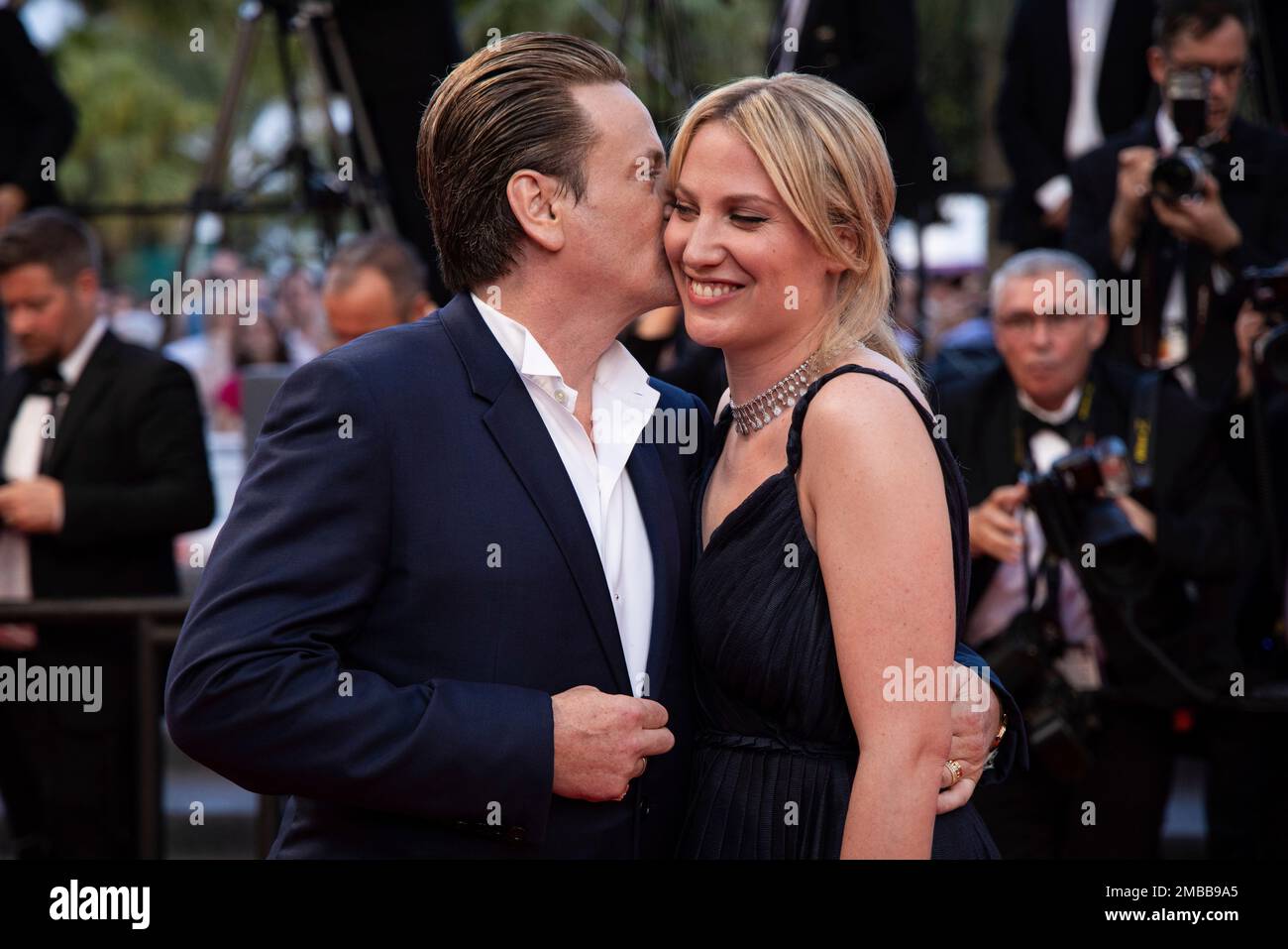 Benoit Magimel and Margot Pelletier pose for photographers upon arrival ...