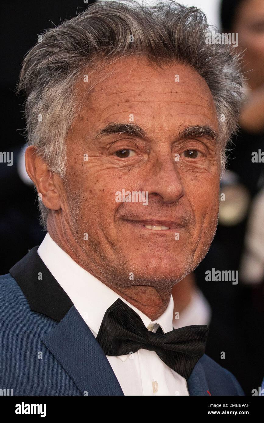 Gerald Holtz poses for photographers upon arrival at the premiere of ...