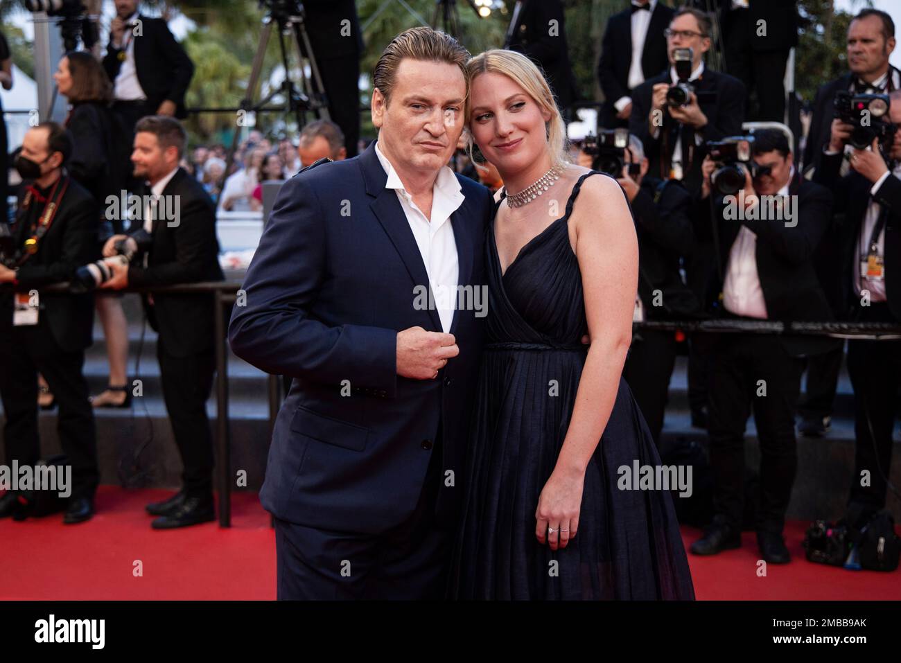 Benoit Magimel and Margot Pelletier pose for photographers upon arrival ...