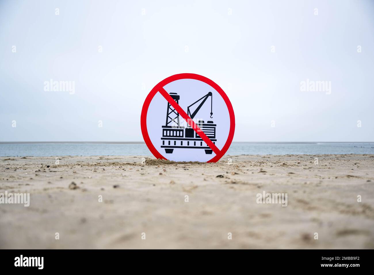 Borkum, Germany. 20th Jan, 2023. A poster against the planned natural ...