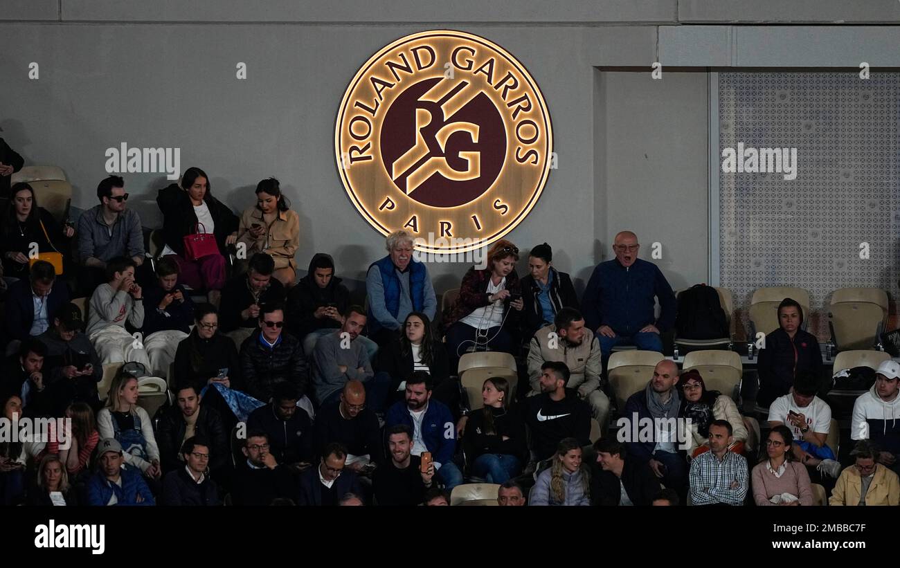 Spectators watch the quarterfinal match between Denmark's Holger Rune ...