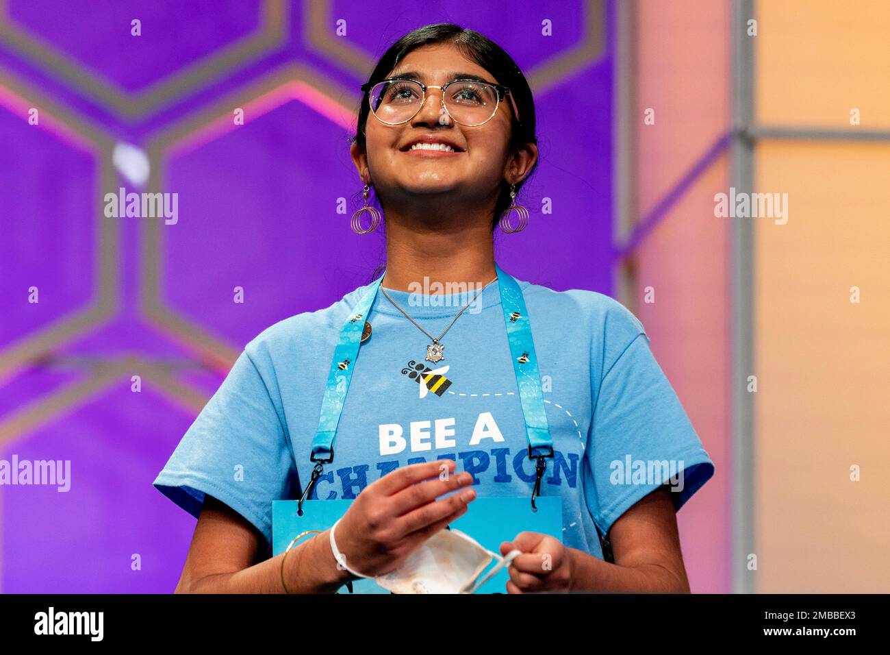 Sahana Srikanth, 13, from Mason, Ohio reacts as she spells her word ...