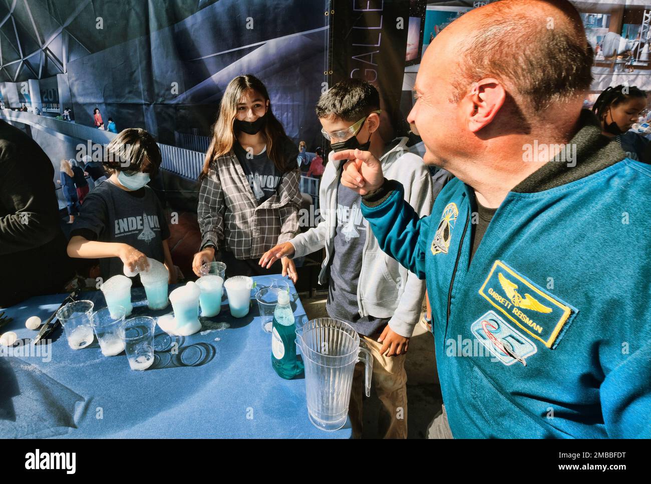 Former NASA astronaut Garrett Reisman interacts with science students ...