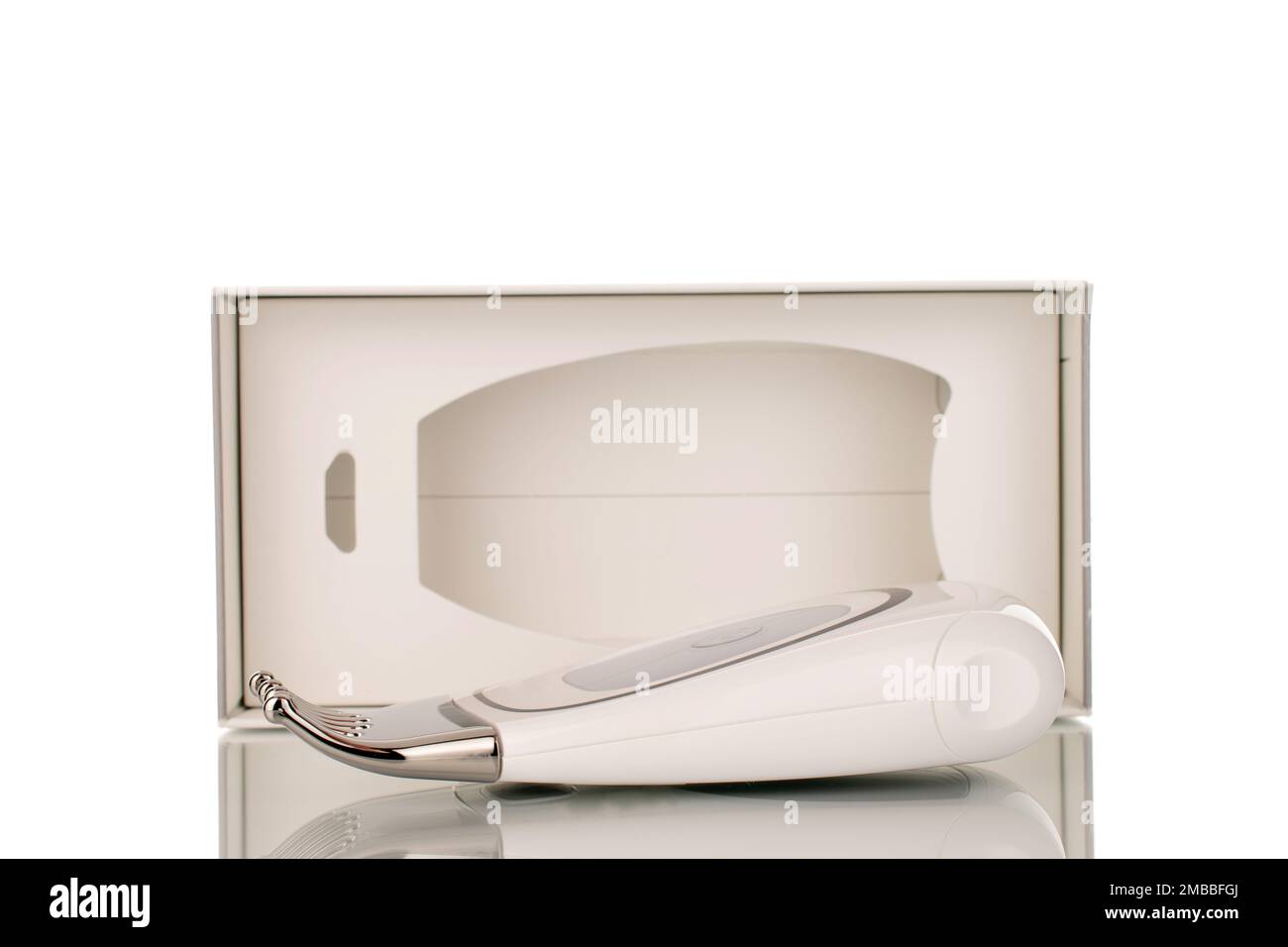 One device for galvanic spa treatments in a paper box, macro, isolated ...