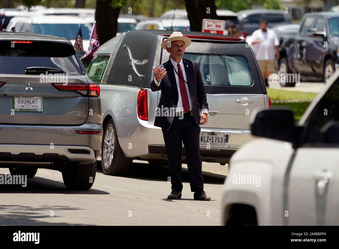 Traffic is directed at the funeral service for Jose Flores Jr. at ...