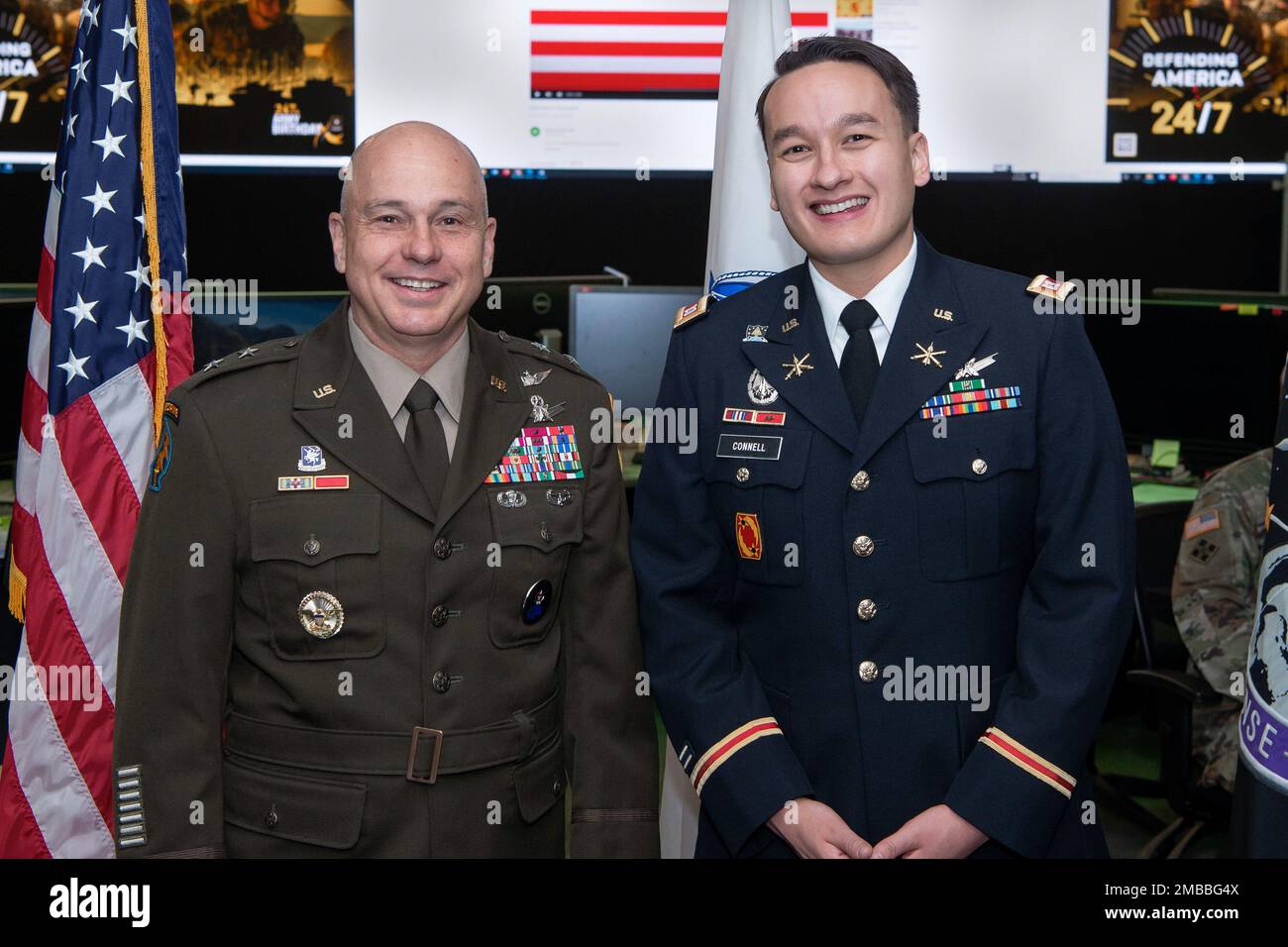 U.S. Army Maj. Gen. Tom James, left, Joint Task Force-Space Defense ...
