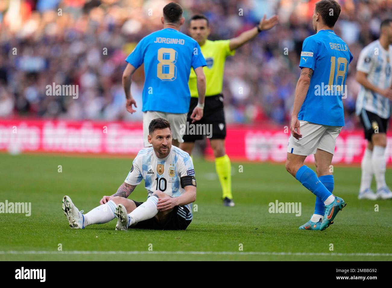 Argentina's Lionel Messi sits on the field after receiving a foul ...