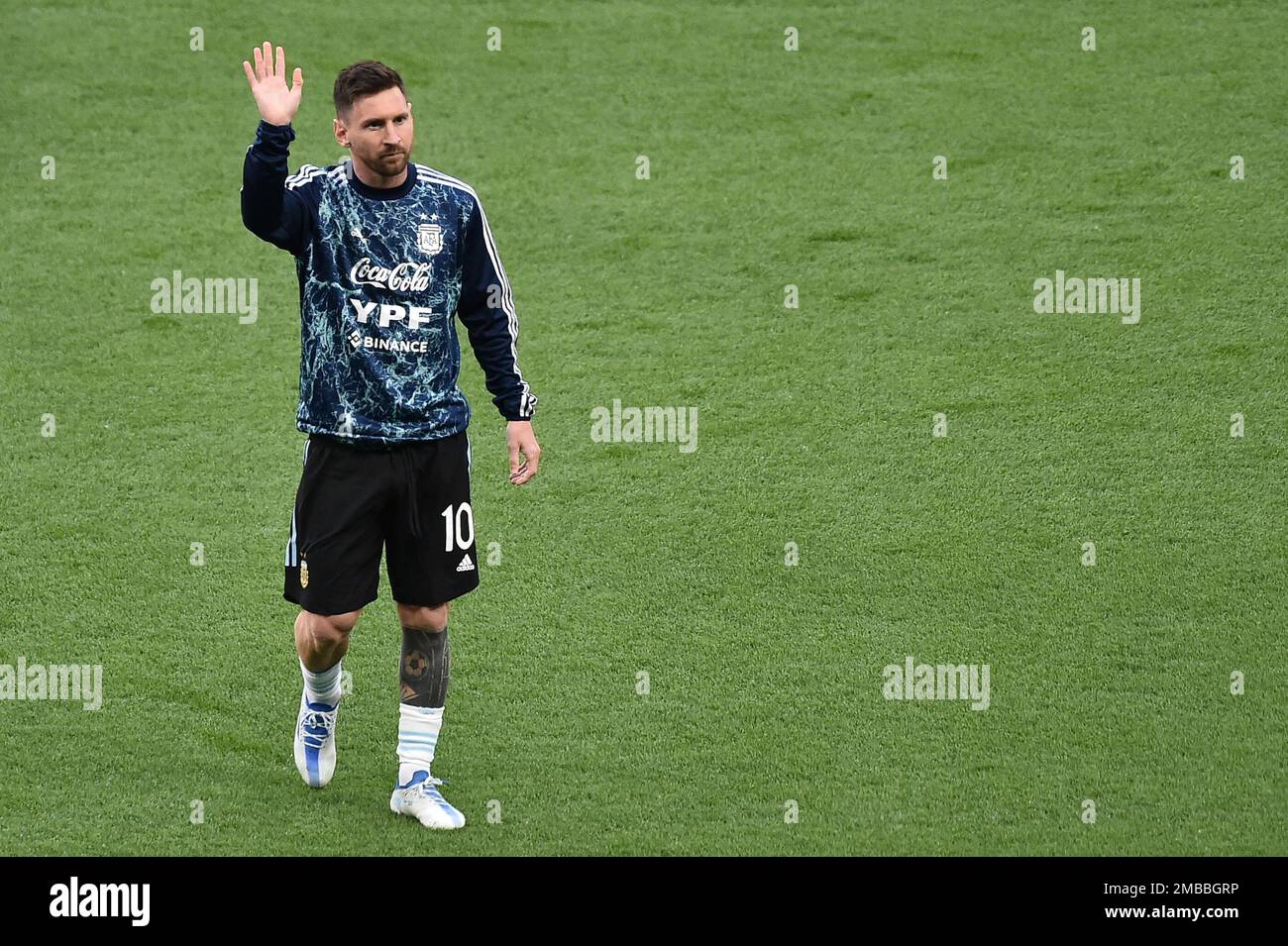 Argentina's Lionel Messi waves his fans during a warm up prior to the ...