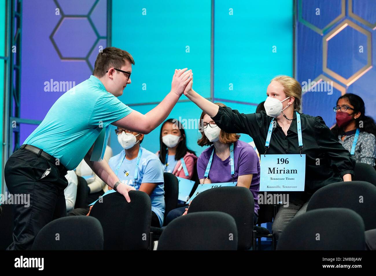 Chris Dominick, 14, from Struthers, Ohio, left, reacts with Miriam ...