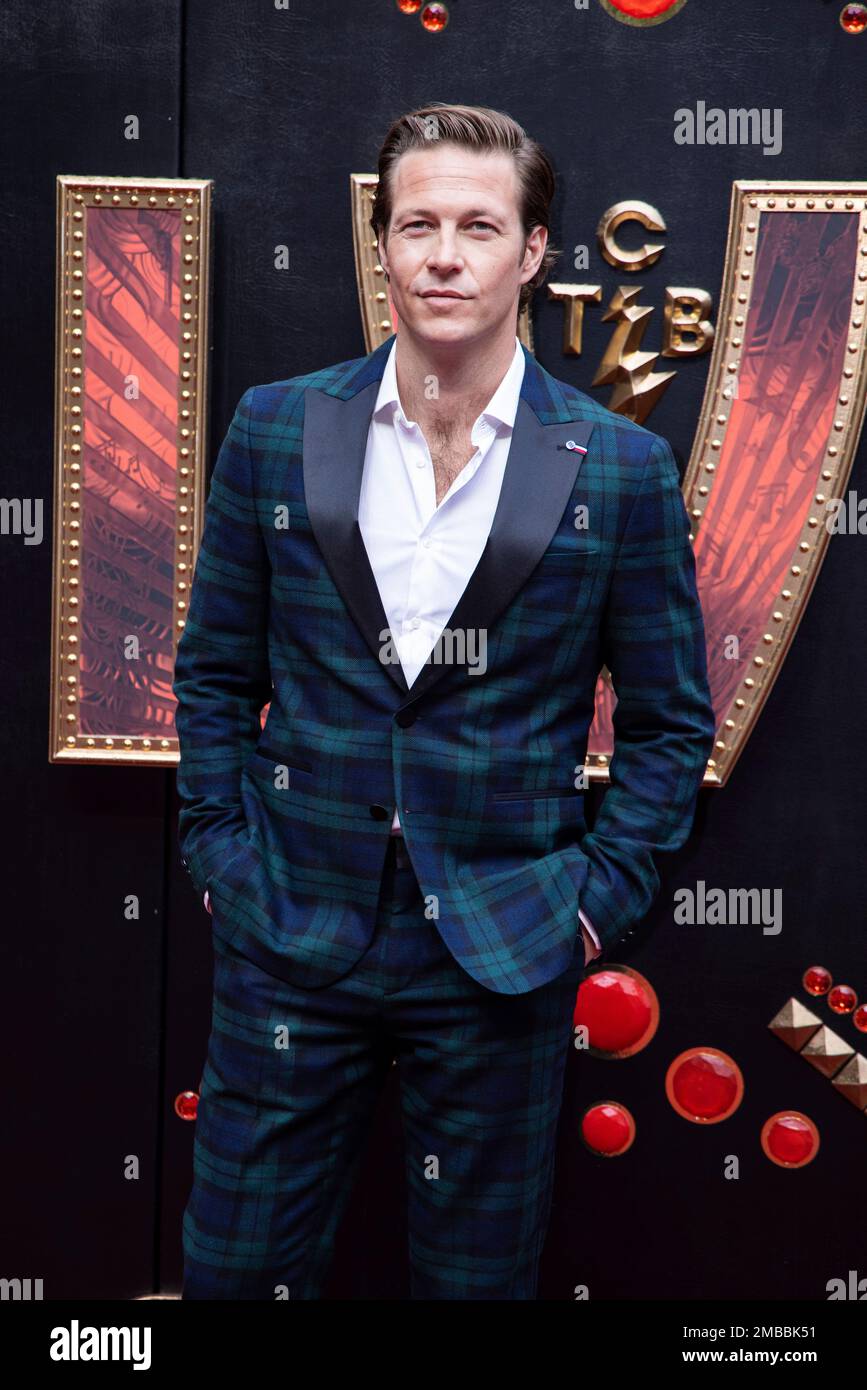 Luke Bracey poses for photographers upon arrival for the premiere of ...